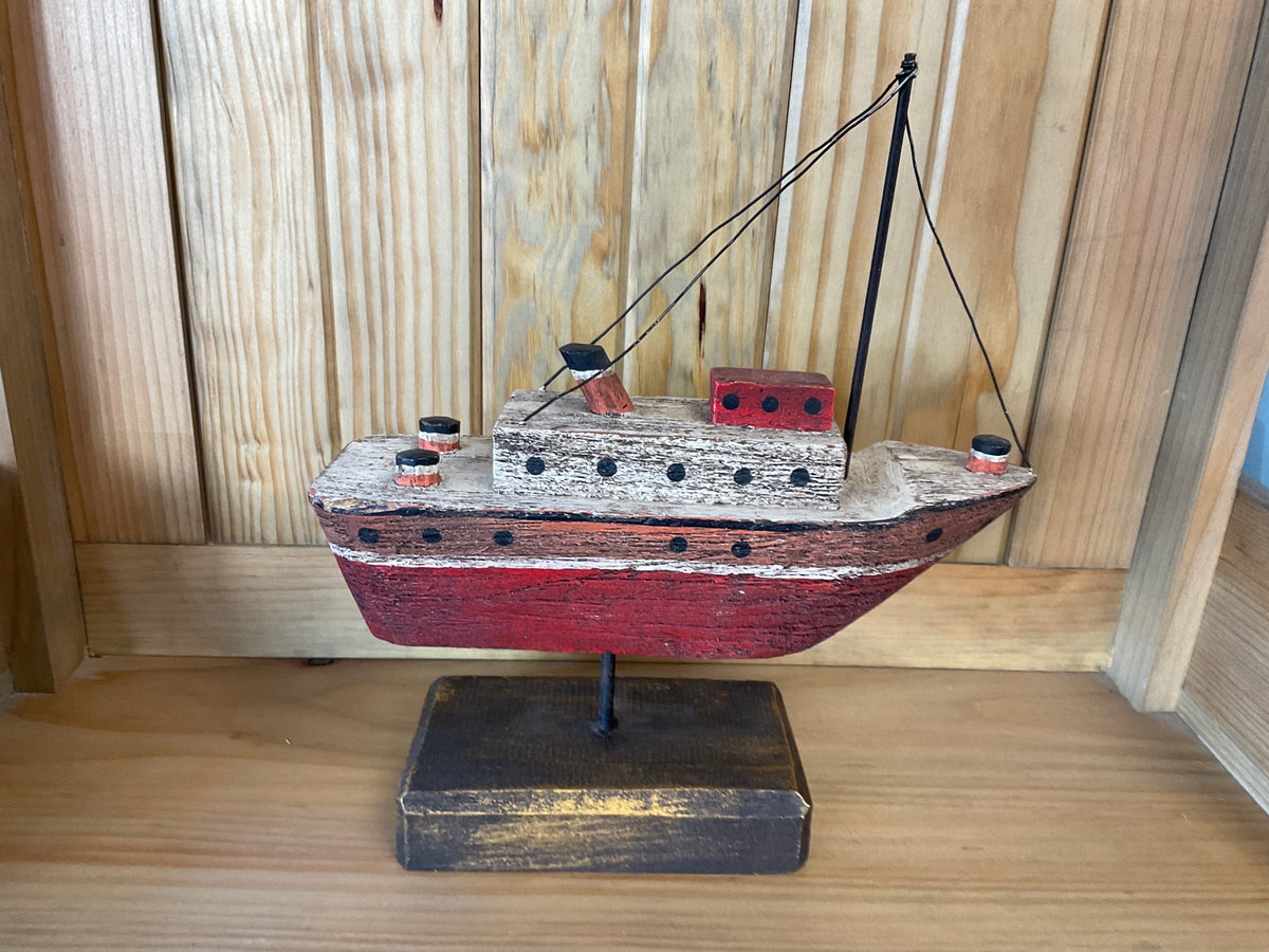 Vintage wood tug boat — White Pine Artisan Market